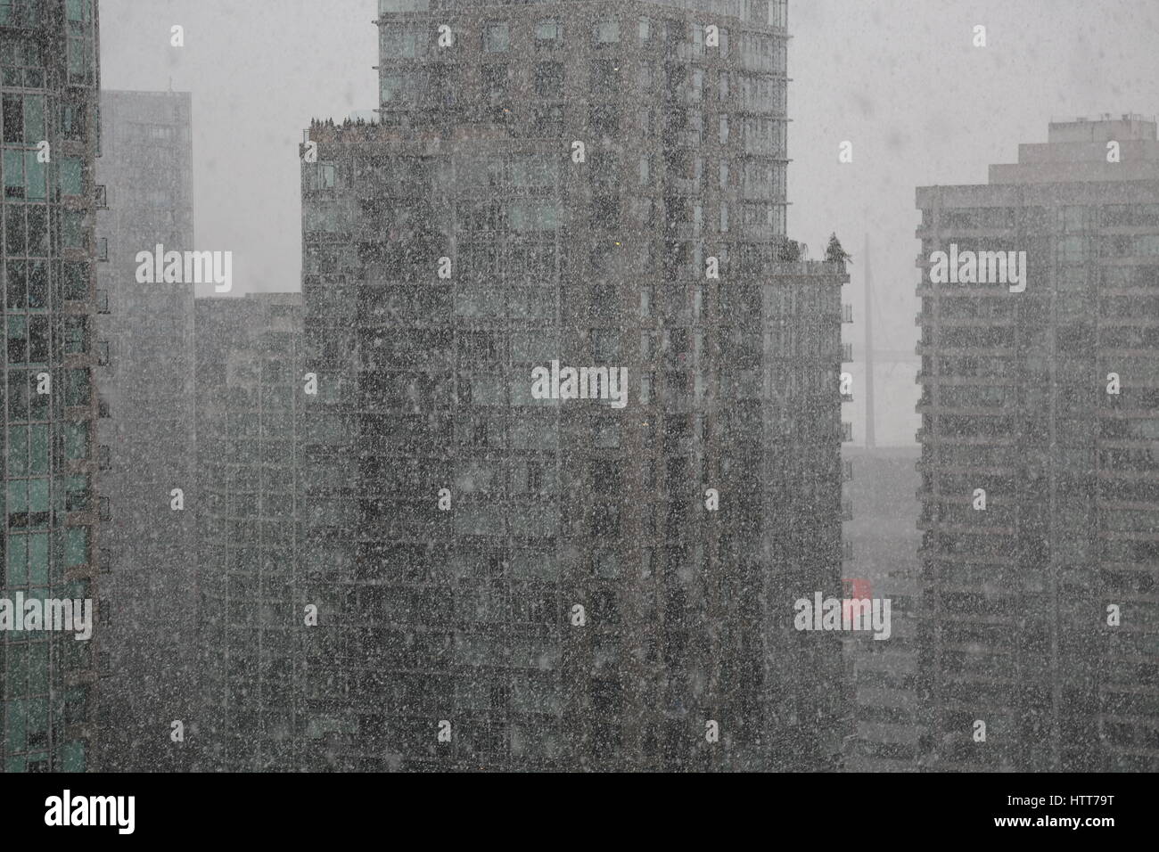 Background snow falling windows highrise buildings Stock Photo - Alamy