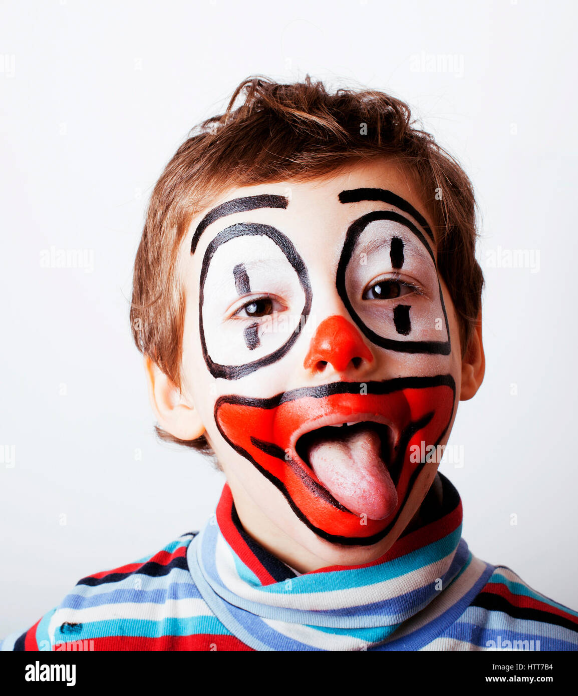 little cute boy with facepaint like clown, pantomimic expression Stock ...