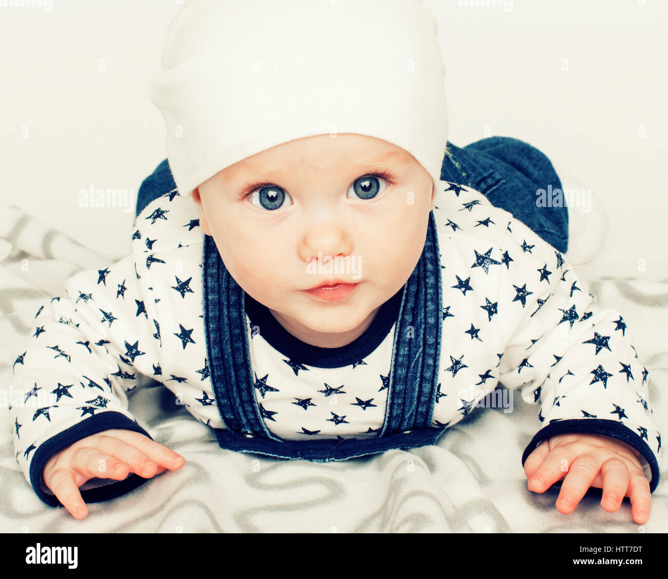 little cute baby toddler on carpet isolated close up smiling ado Stock ...