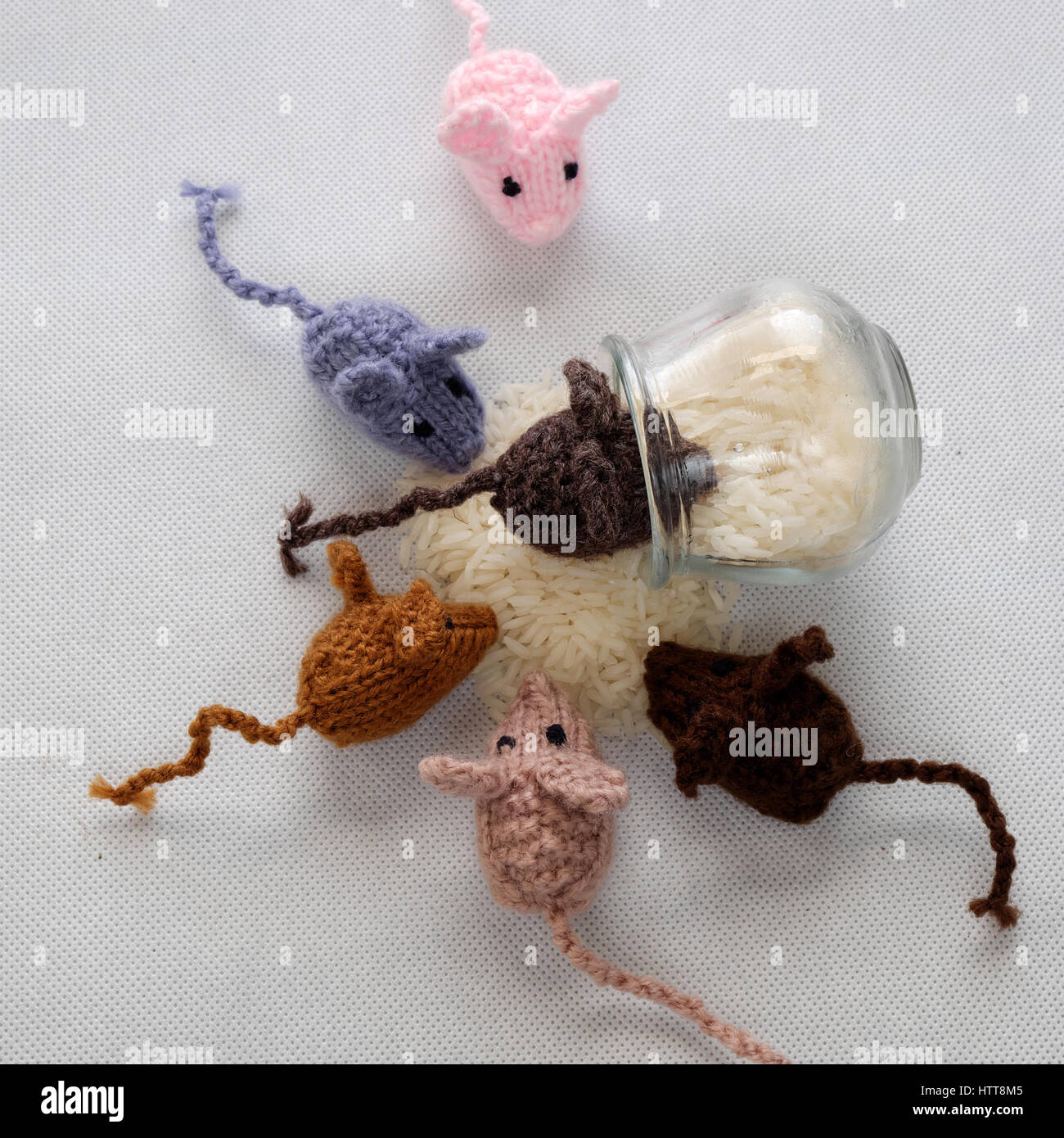 Funny concept from handmade product, group of tiny mice eat rice ...