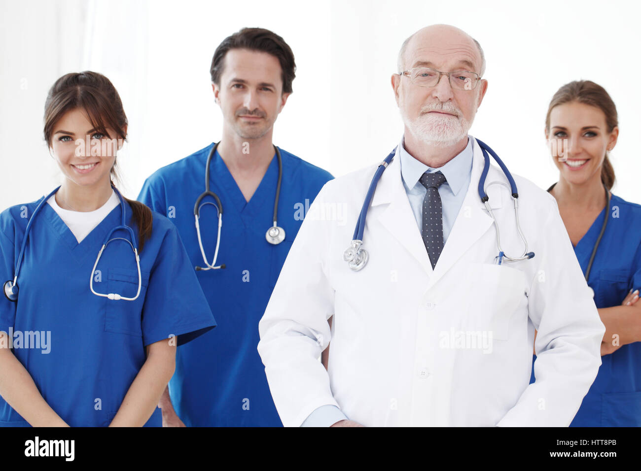 Team of professional doctors isolated on white background Stock Photo ...