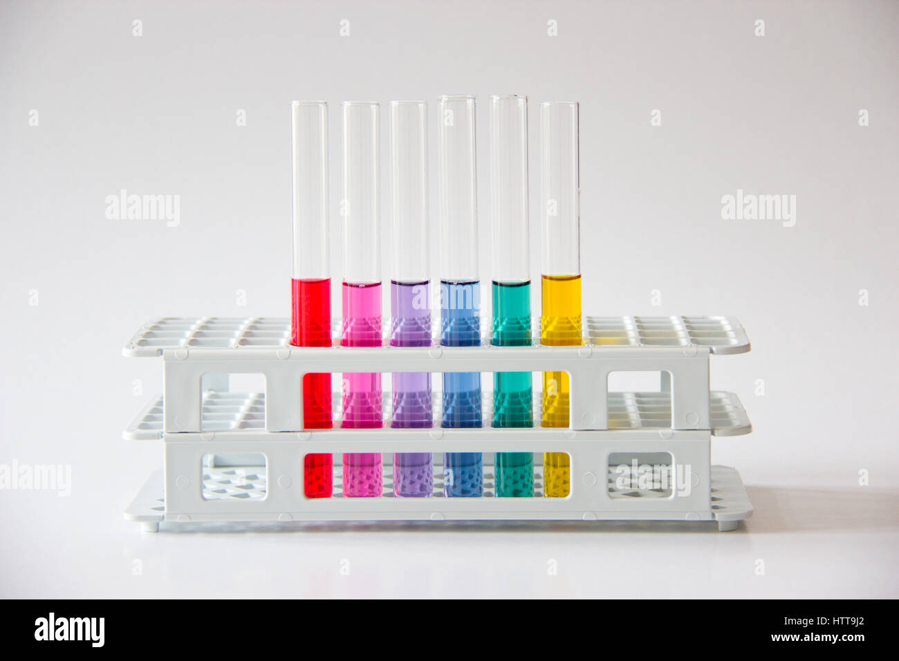 Test Tubes in White Laboratory running a scientific experiment Stock ...
