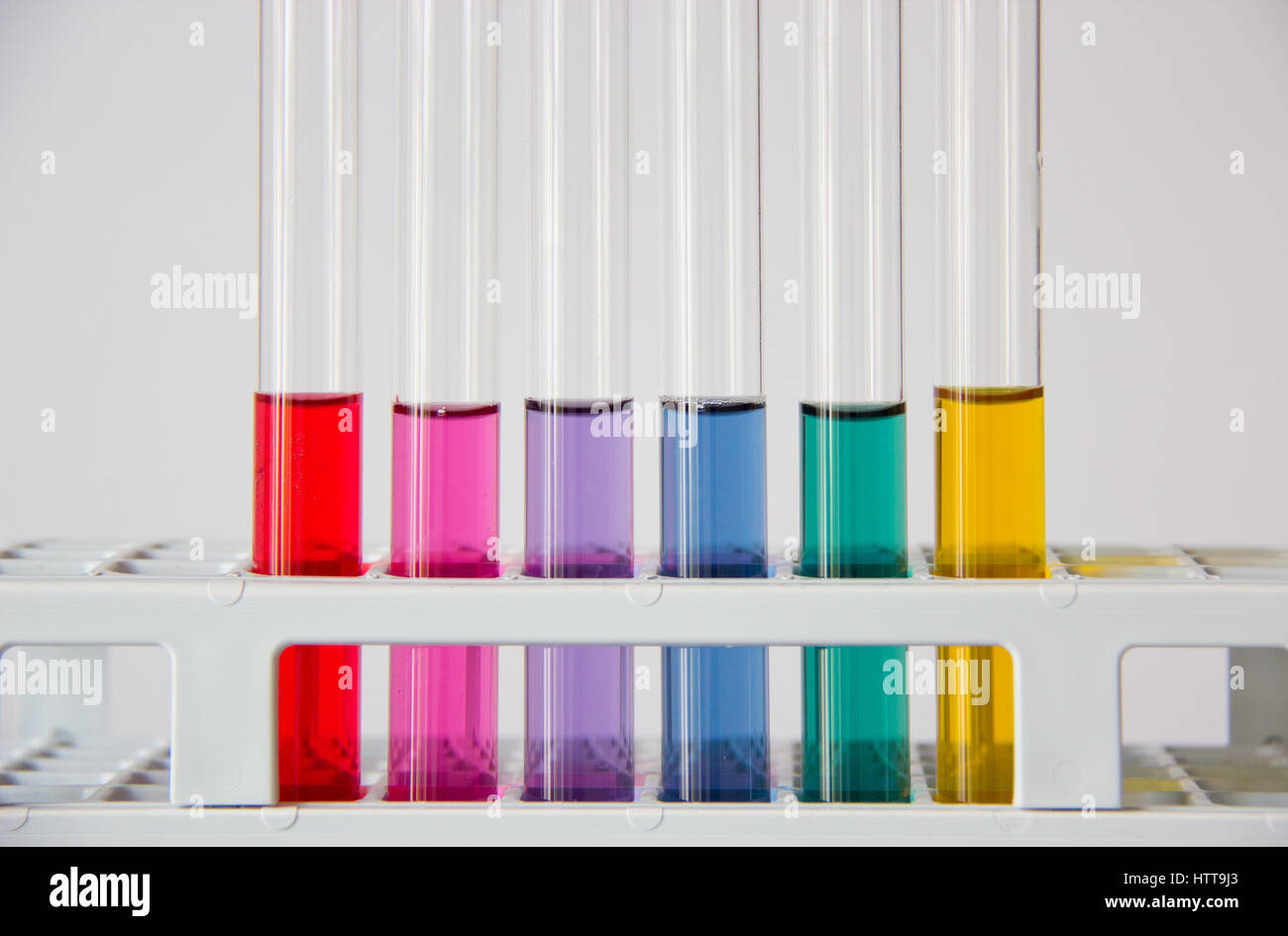 Test Tubes in White Laboratory running a scientific experiment Stock ...