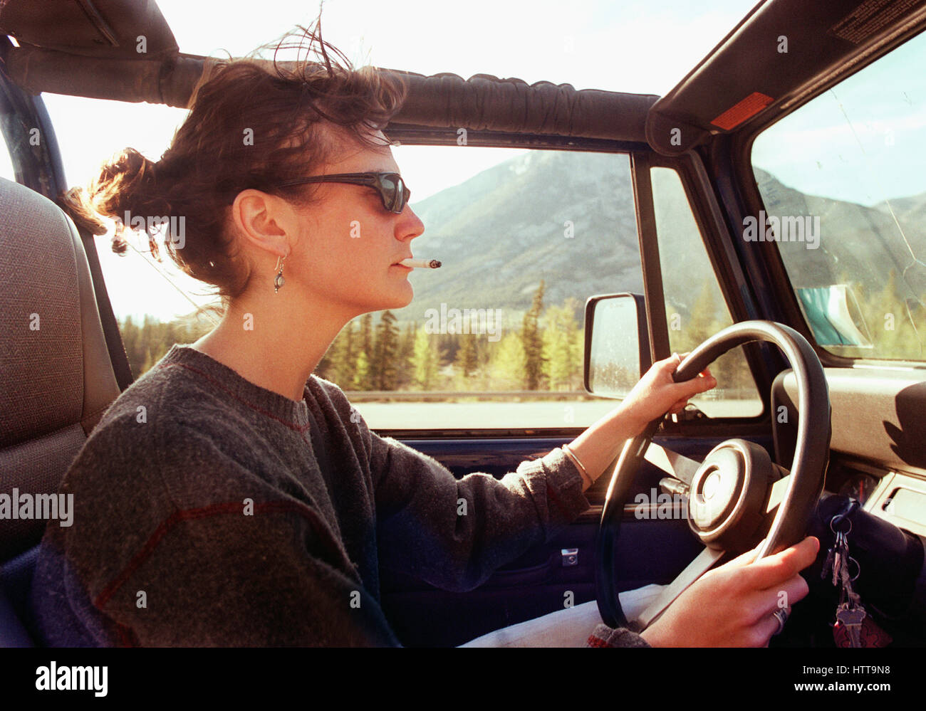 Young woman driving jeep hi-res stock photography and images - Alamy