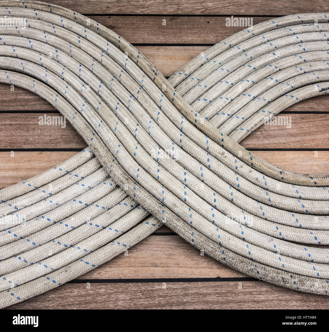 Neatly coiled rigging ropes on boat Stock Photo - Alamy