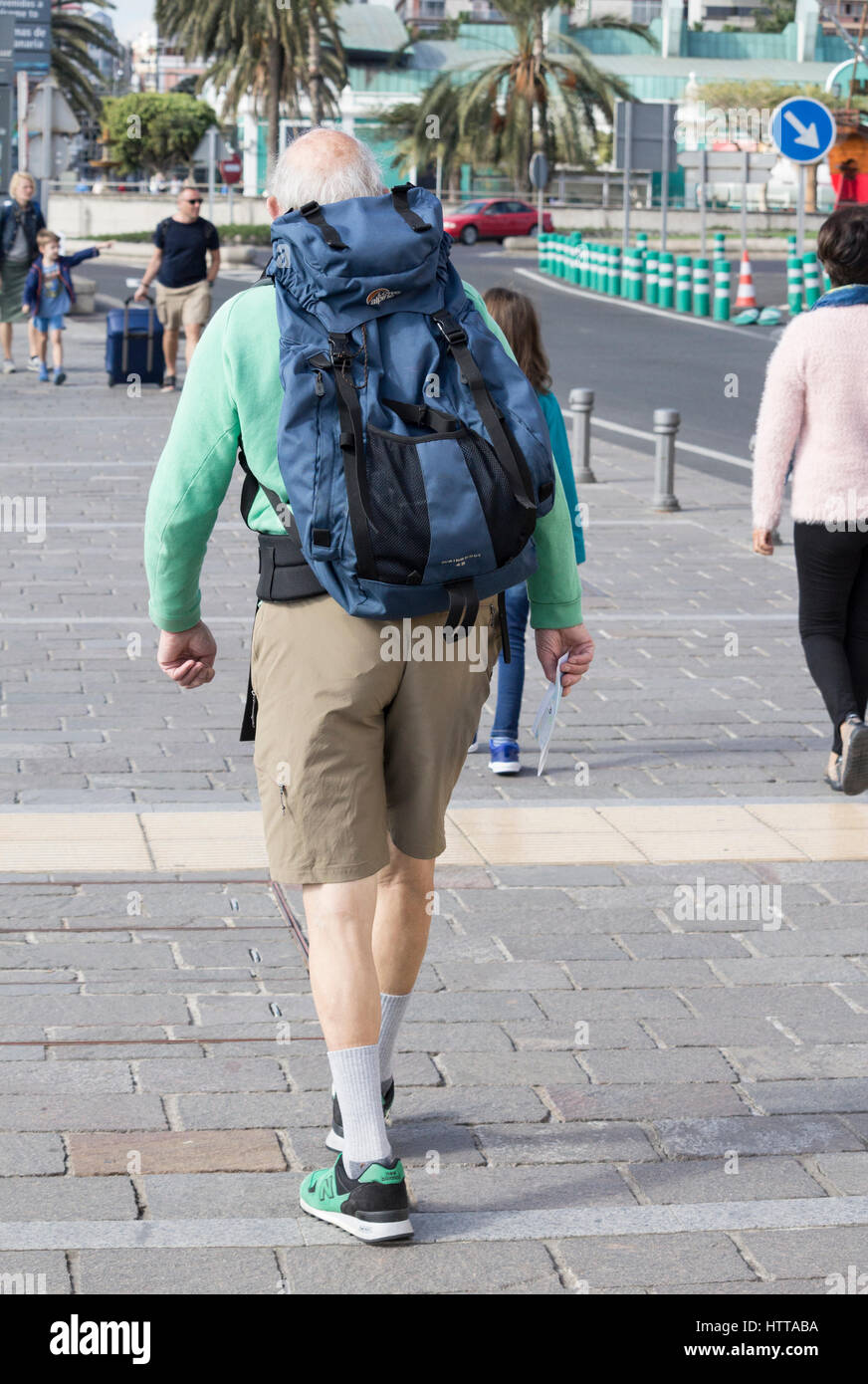 Elderly man backpacking in Spain Stock Photo - Alamy