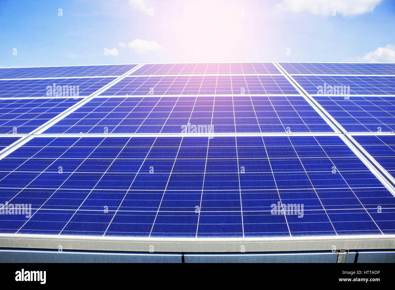 Solar panels on the blue sky Stock Photo - Alamy