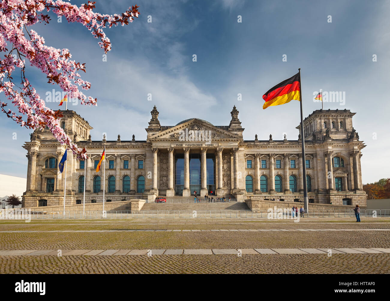 Flag of germany on reichstag building hi-res stock photography and ...