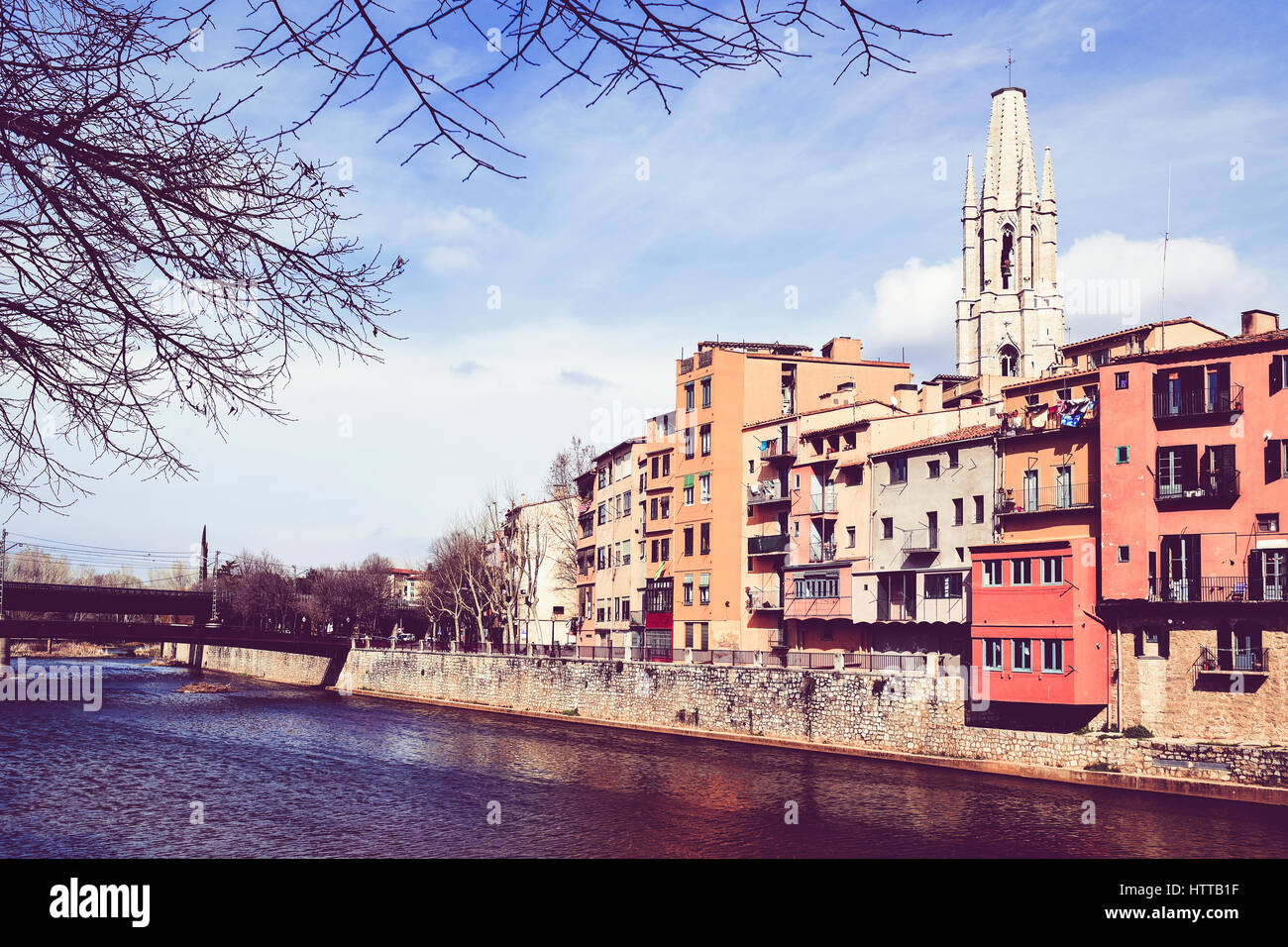 a view of the Onyar River as it passes through Girona, in Spain, and ...