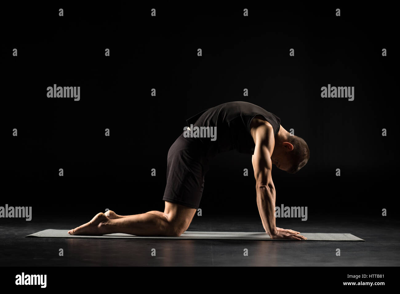 Man standing in yoga position Stock Photo - Alamy