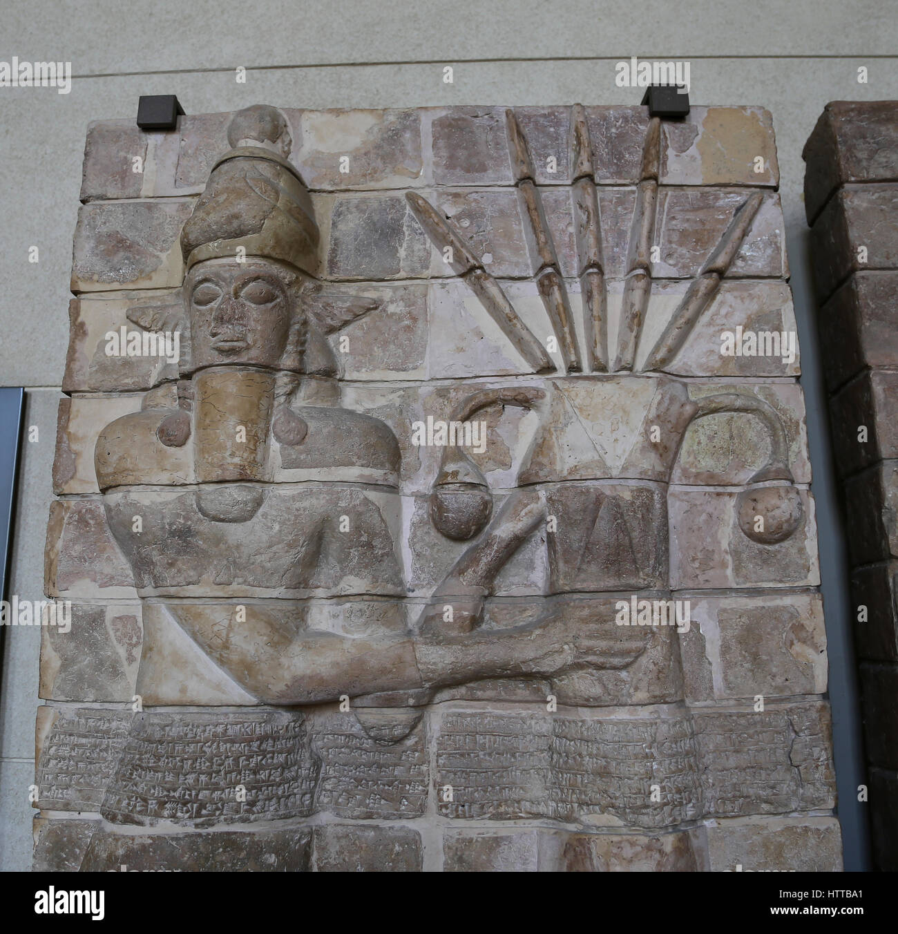 Elam. Moulded clay brick panel: God (bull-man) with palm-trees (symbols ...