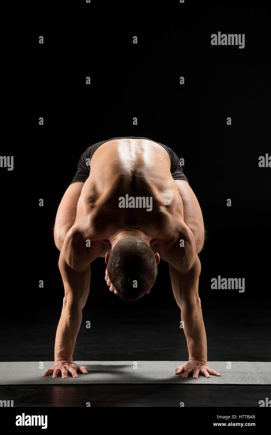 Man standing in yoga position Stock Photo - Alamy