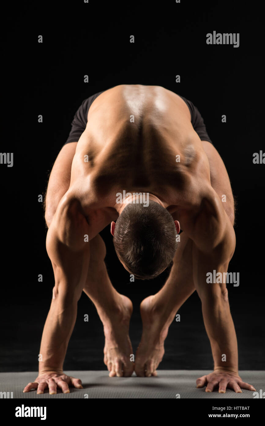 Man standing in yoga position Stock Photo - Alamy