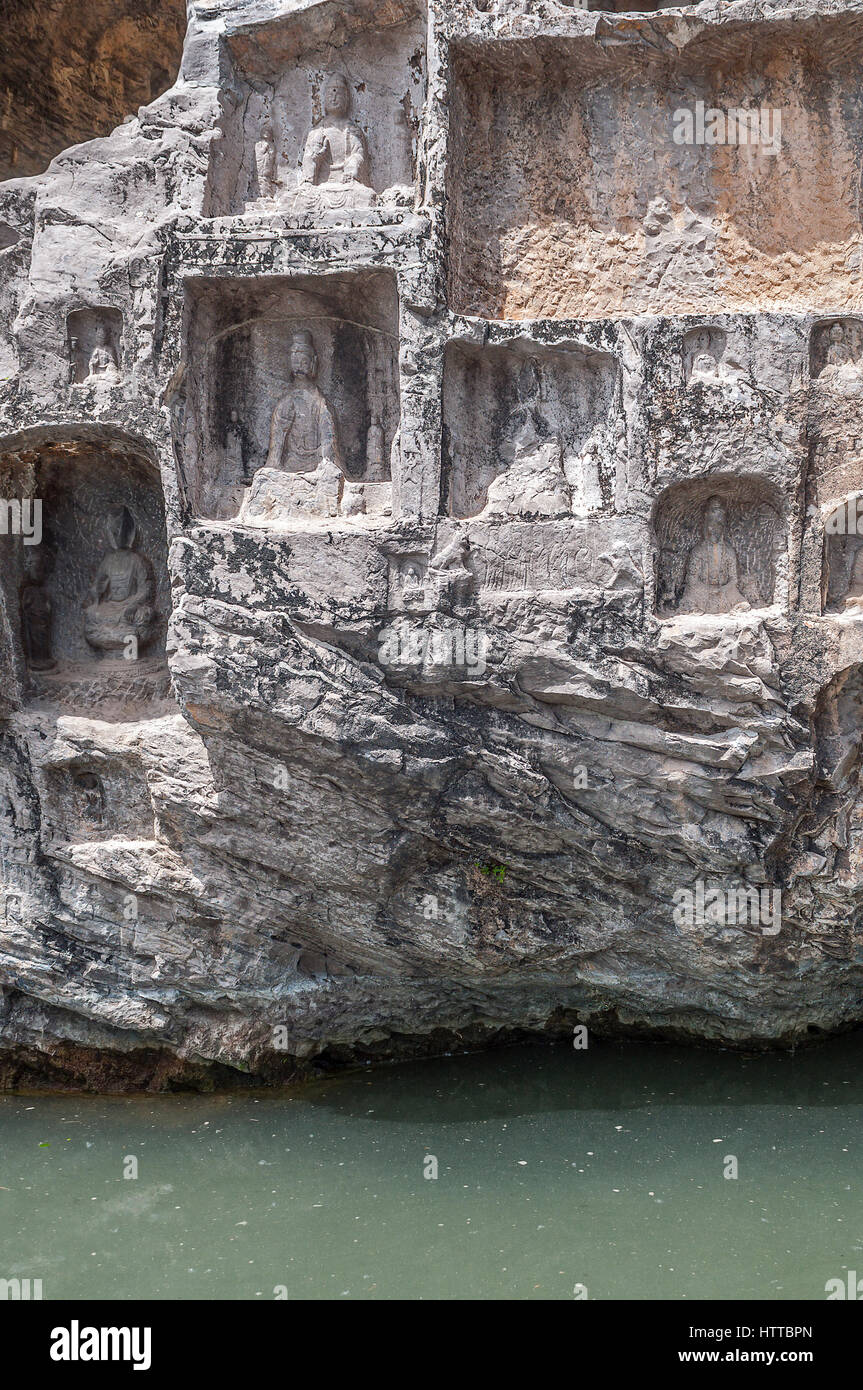 Luoyang . Longmen Grottoes is one of the three major cave - temple ...