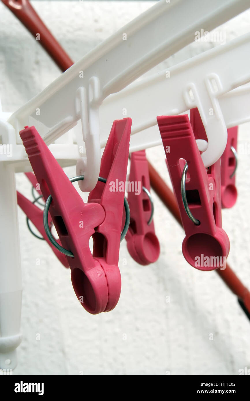 Red plastic clothespin Stock Photo - Alamy