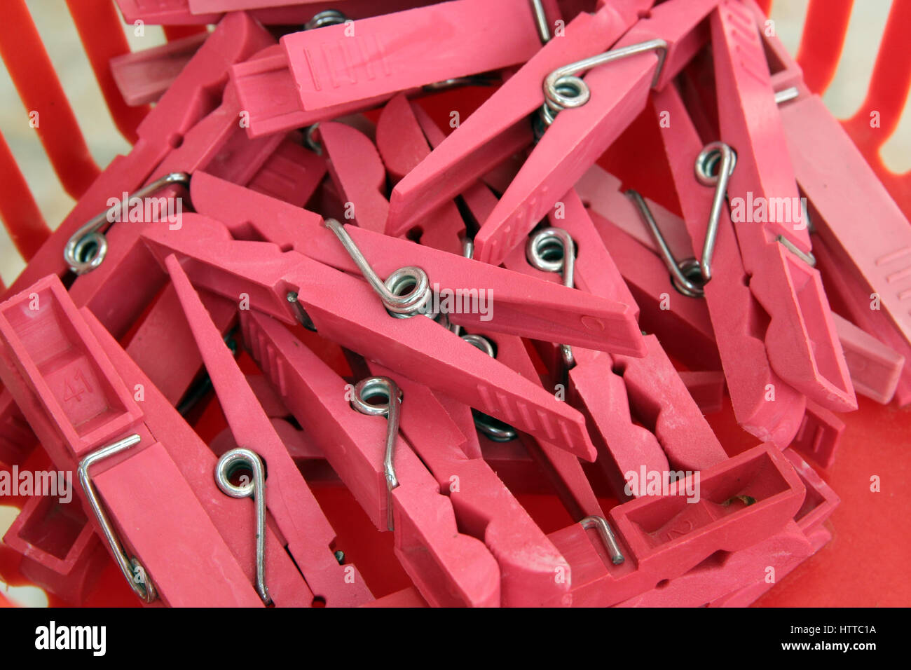 Red plastic clothespin Stock Photo - Alamy