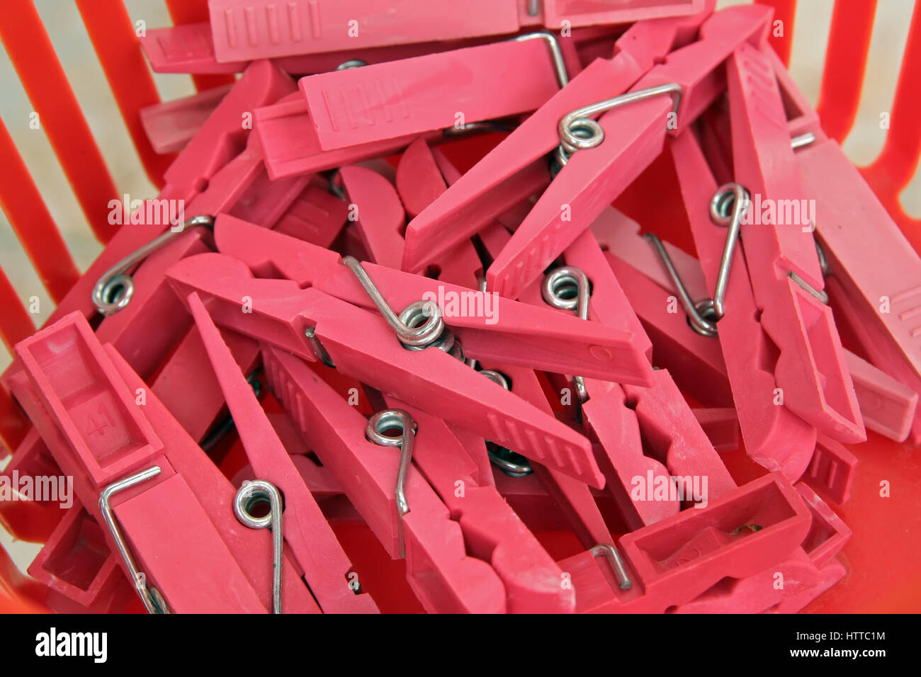 Red white plastic clothes peg hi-res stock photography and images - Alamy