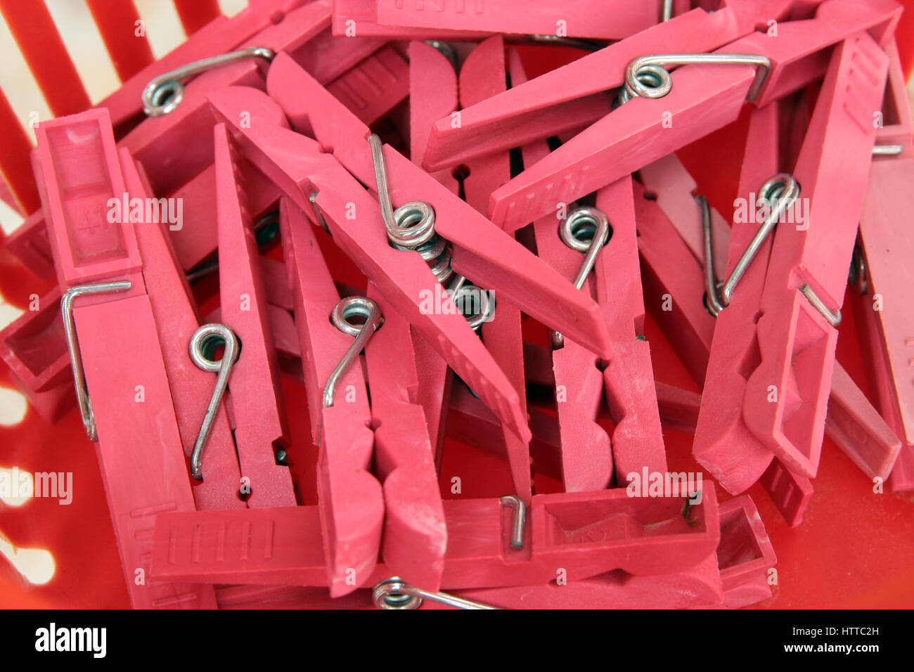 Red plastic clothespin Stock Photo - Alamy
