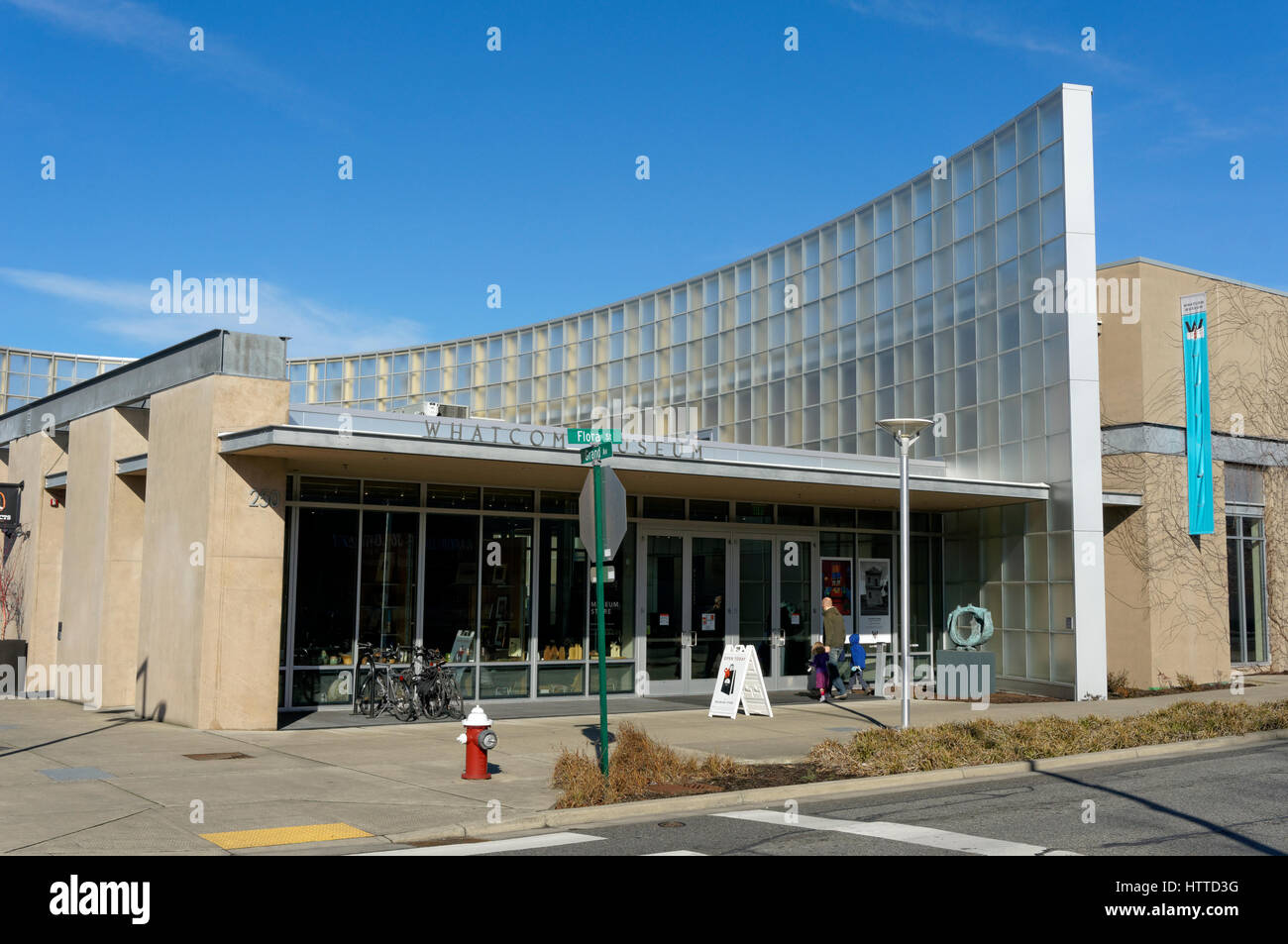 Man and two children entering the the Lightcatcher building, Whatcom ...