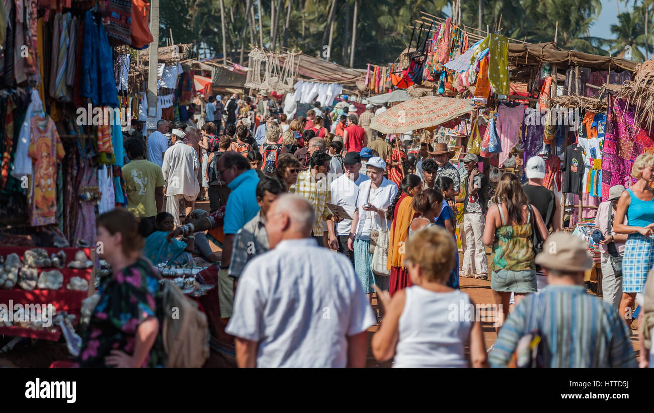 Goa, India - January 2008 - Tourists and local traders at the famous ...