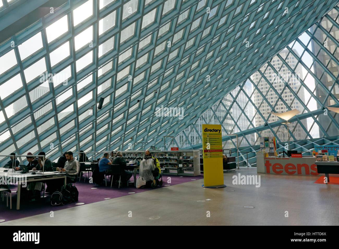 People seated in the Living Room on Level 3 of Seattle Central Library ...