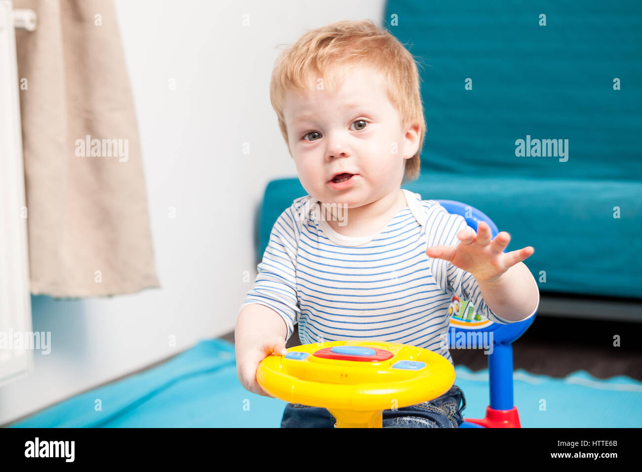 Smiling child boy at his home. Little boy having fun Stock Photo - Alamy