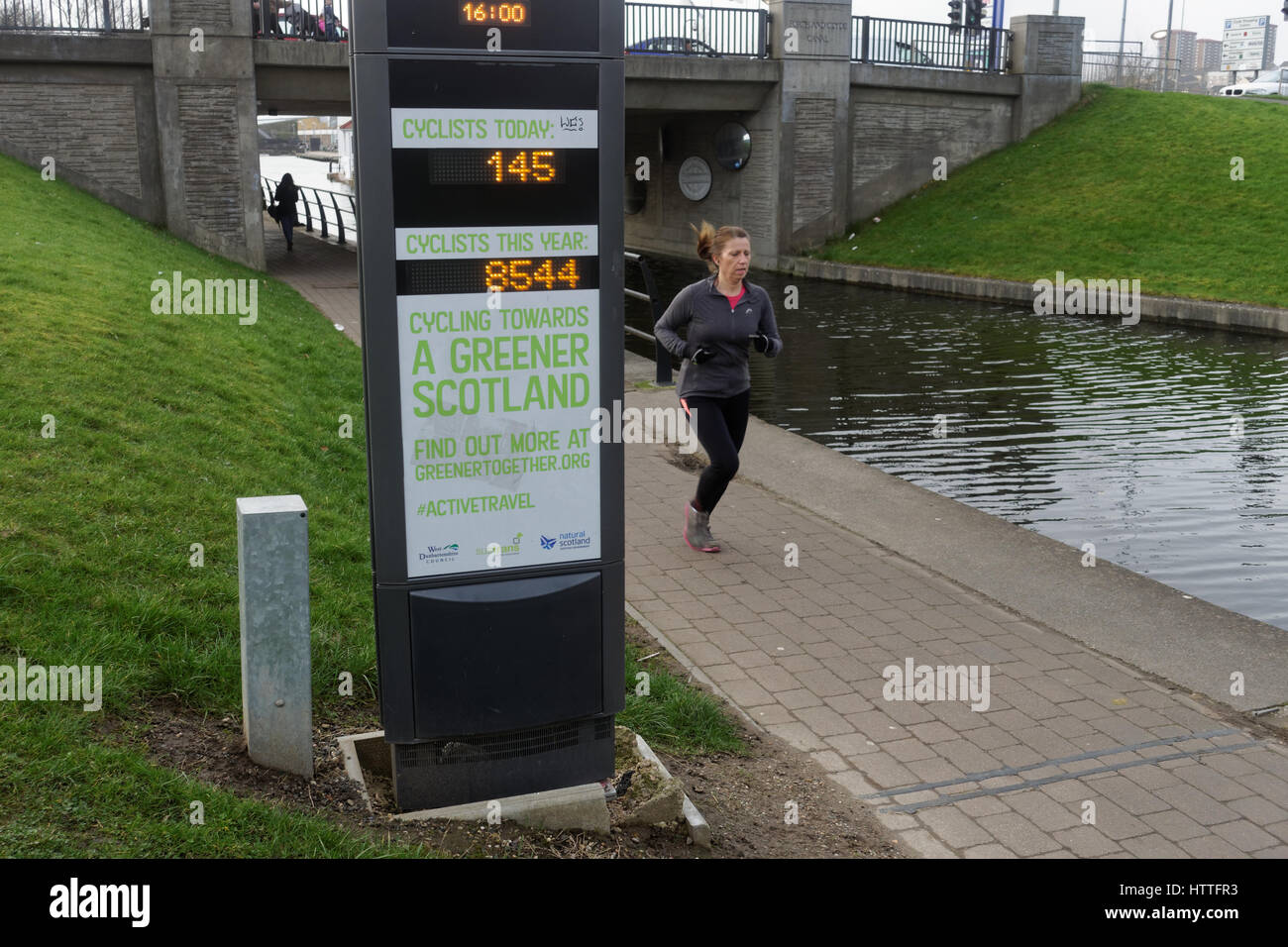 Glasgow canal and cycle path cyclist bike runner Stock Photo - Alamy