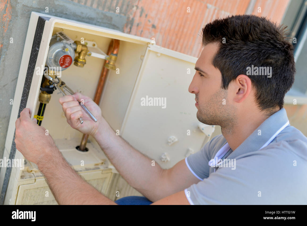 Checking the water meter Stock Photo - Alamy