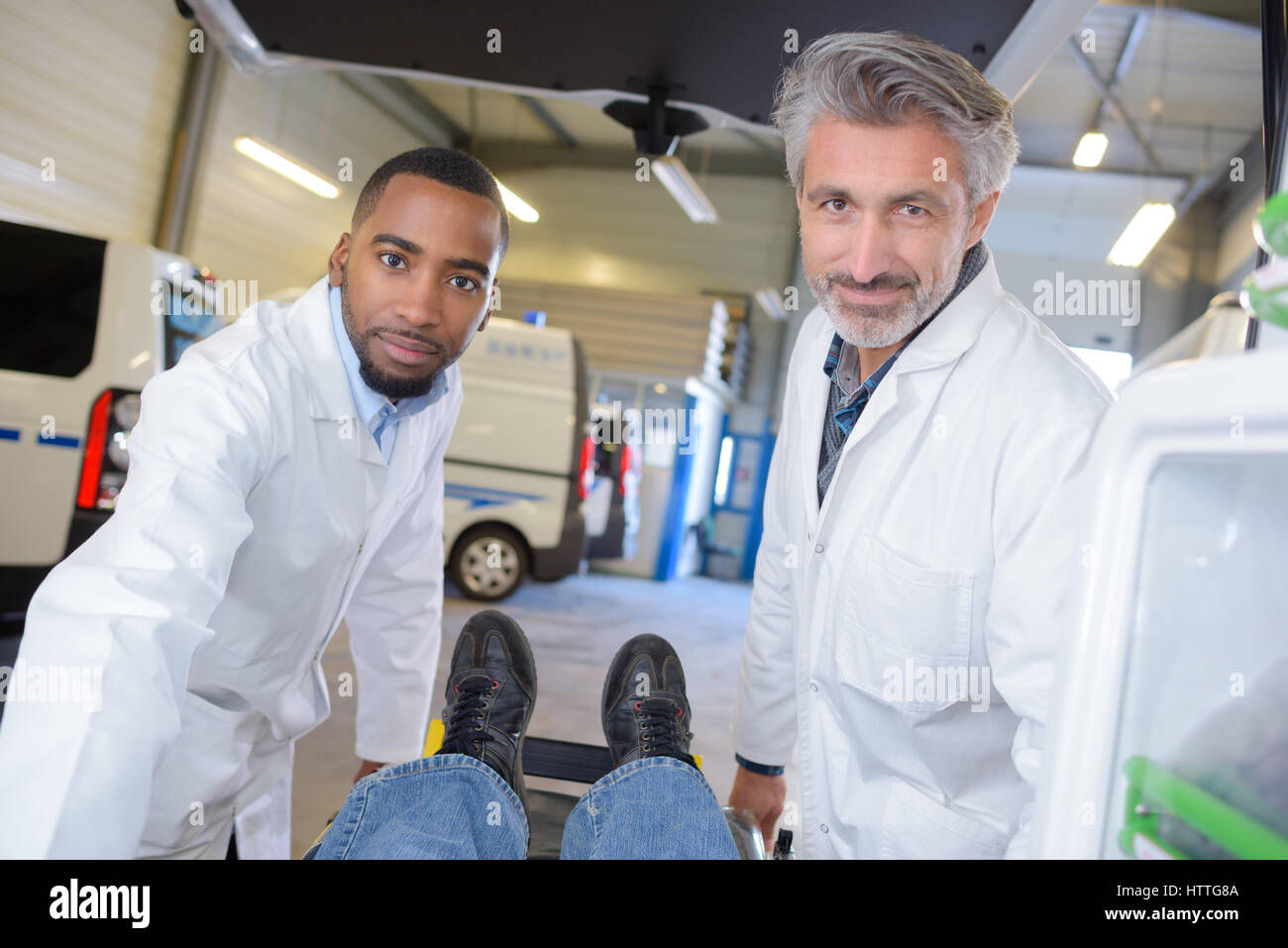 Ambulance men medical workers hi-res stock photography and images - Alamy