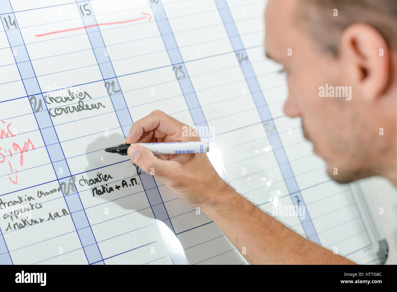Writing on a wall calendar Stock Photo - Alamy