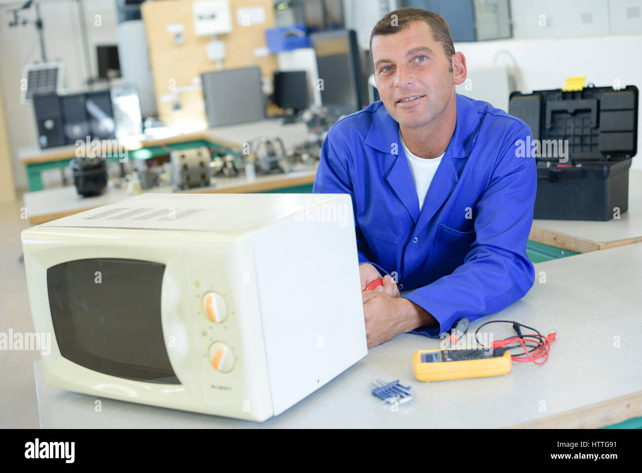 man with a microwave Stock Photo - Alamy