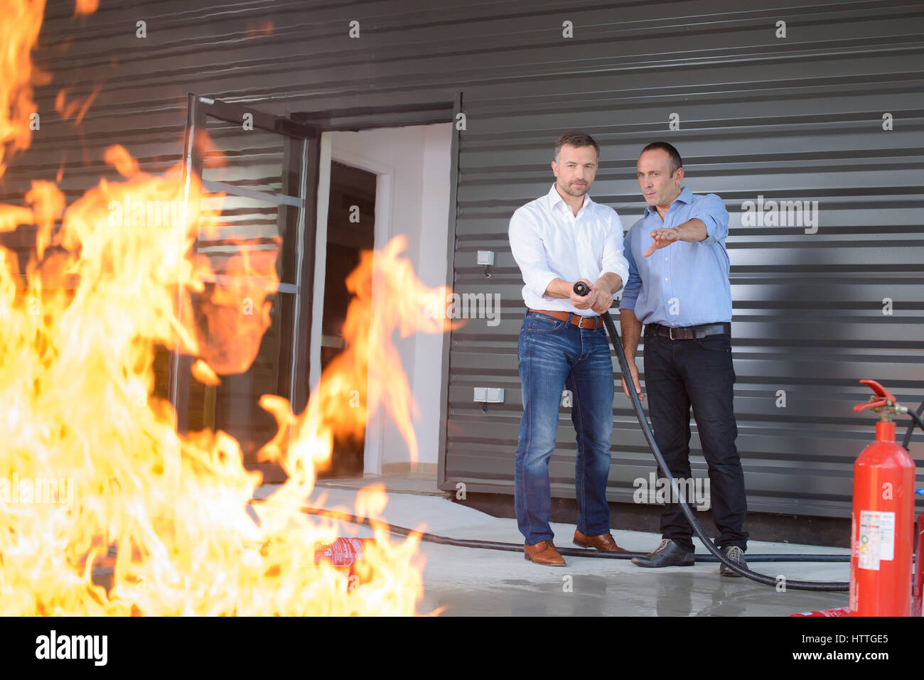 controlling the fire Stock Photo - Alamy