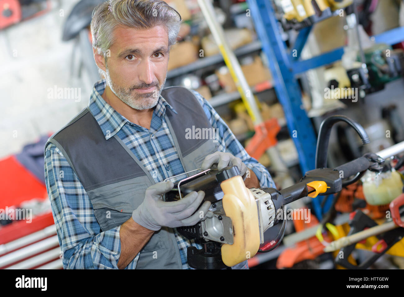 industrial worker fixing an equipment Stock Photo - Alamy