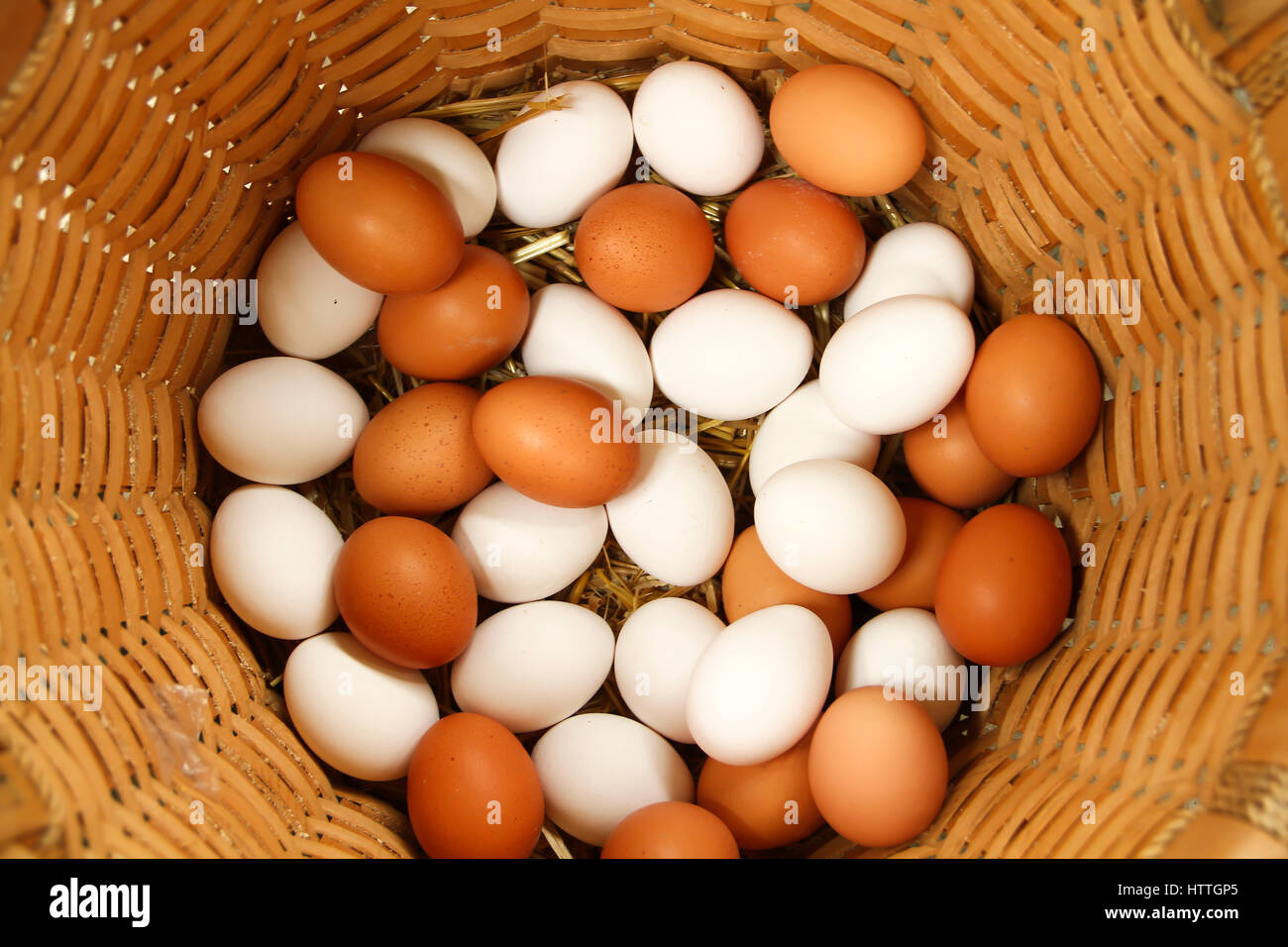 Eggs in basket Stock Photo - Alamy