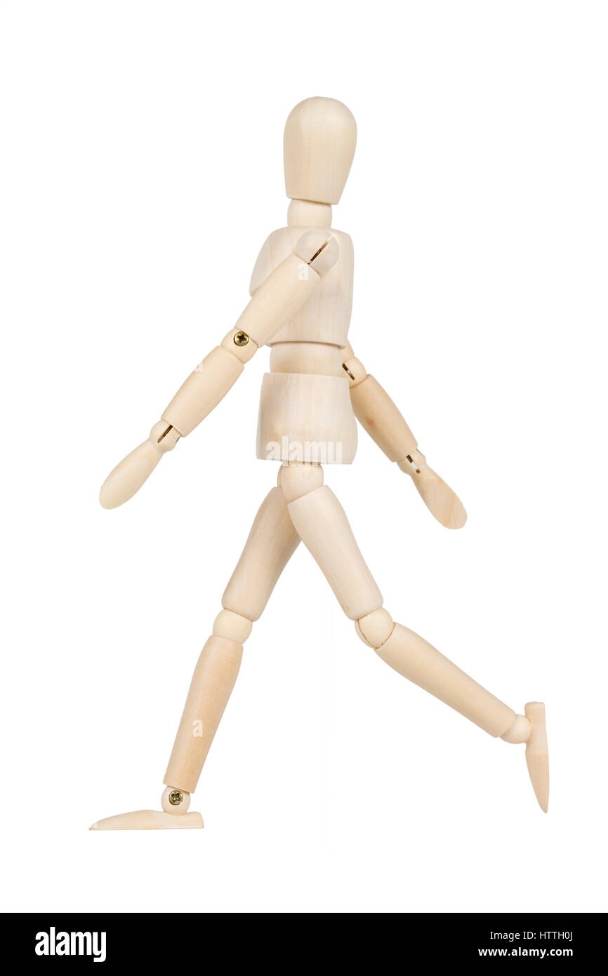 Wooden model walking isolated on a white background Stock Photo - Alamy