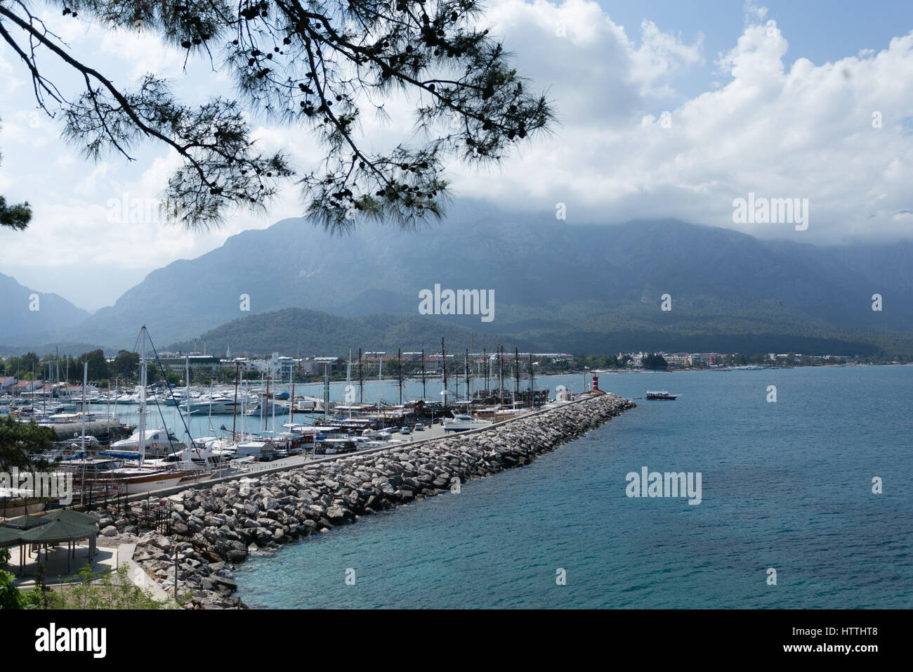 KEMER, TURKEY - APRIL 25 View of yacht marina and mountains with ...