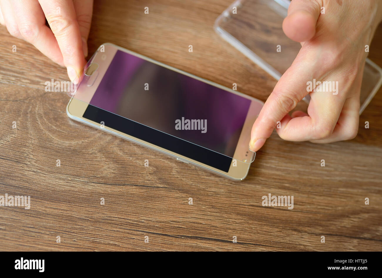Kit of installing safety glass on smartphone Stock Photo - Alamy