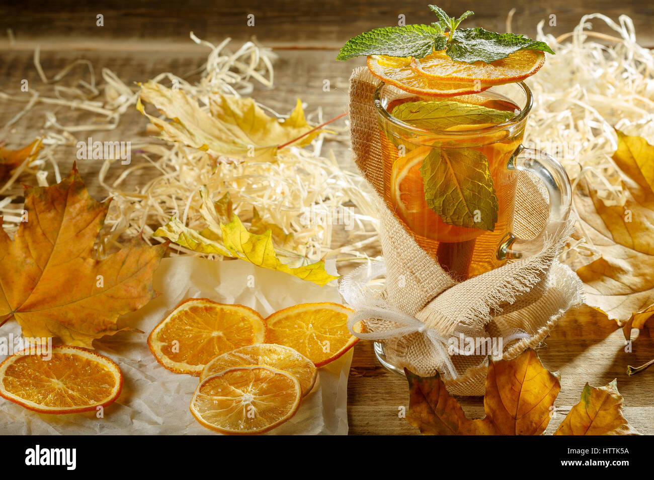 Ice tea with lemon splash. Hot yellow tea with lemon and many slices of ...
