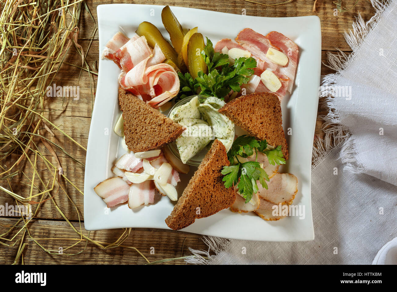 Different types of steaks set. Assorted raw meat on a black chalk board ...