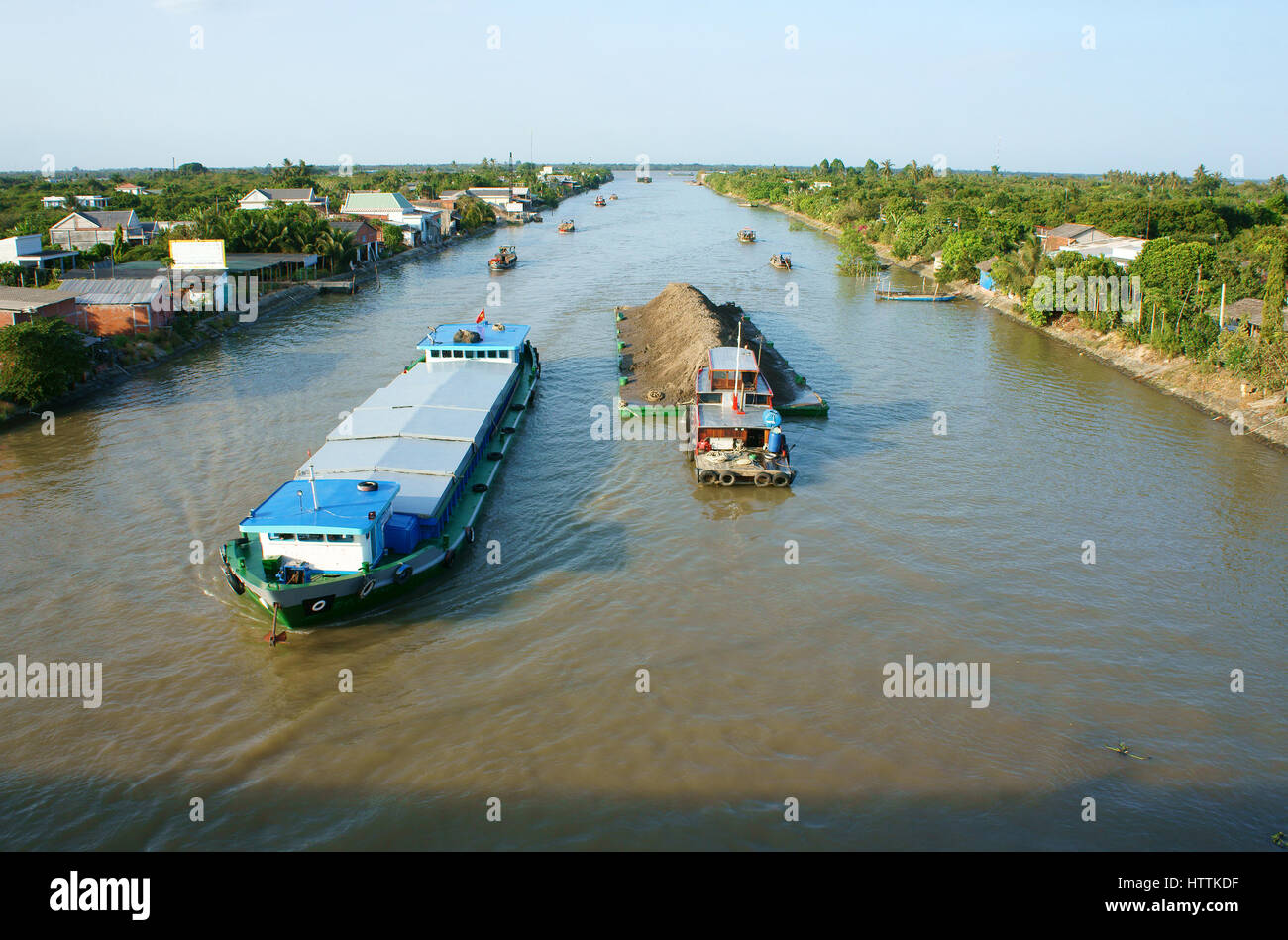 Group of Asia ship with river traffic on Mekong Delta river to ...