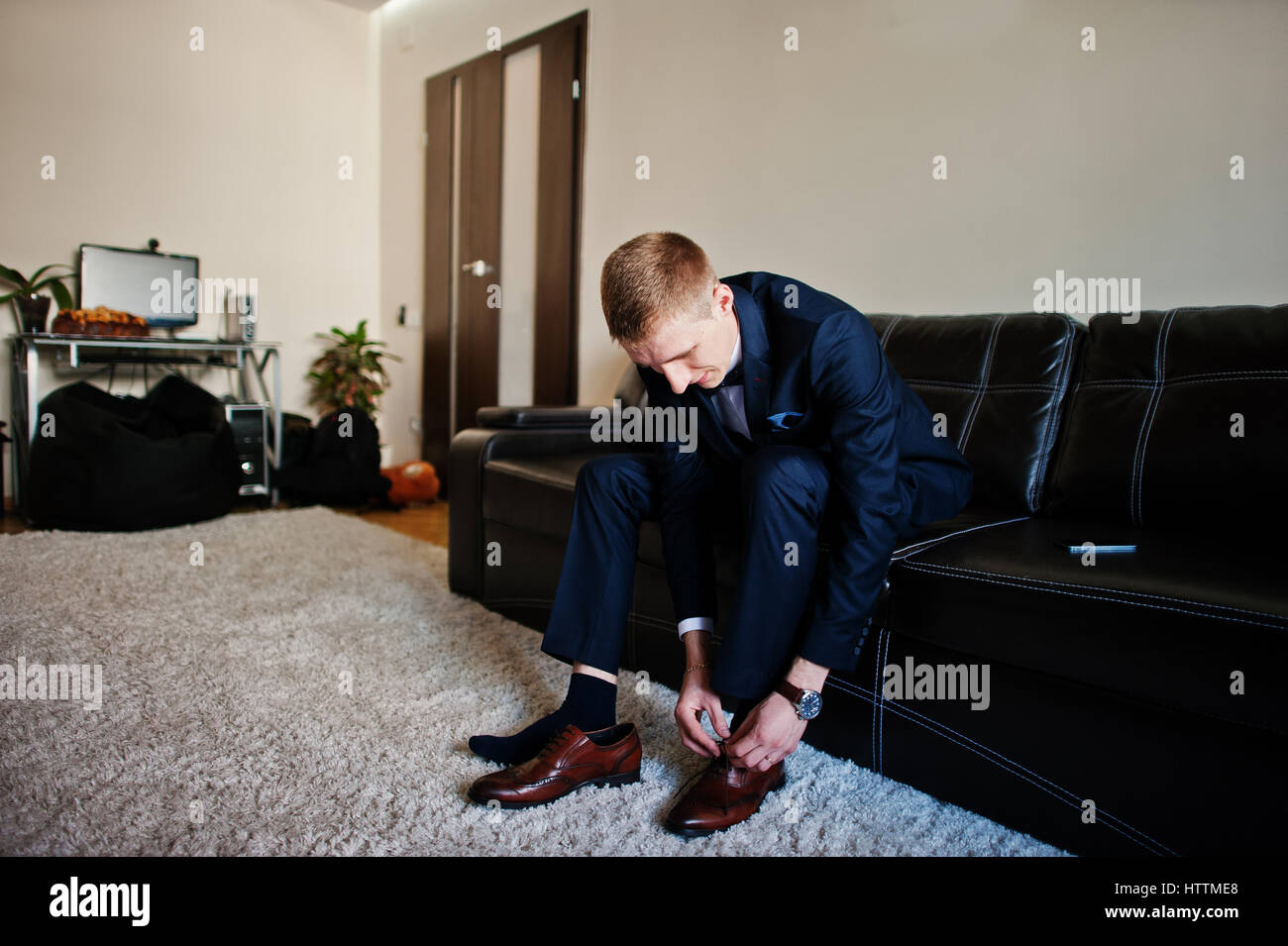 Man wear shoes, morning of groom at wedding day Stock Photo - Alamy