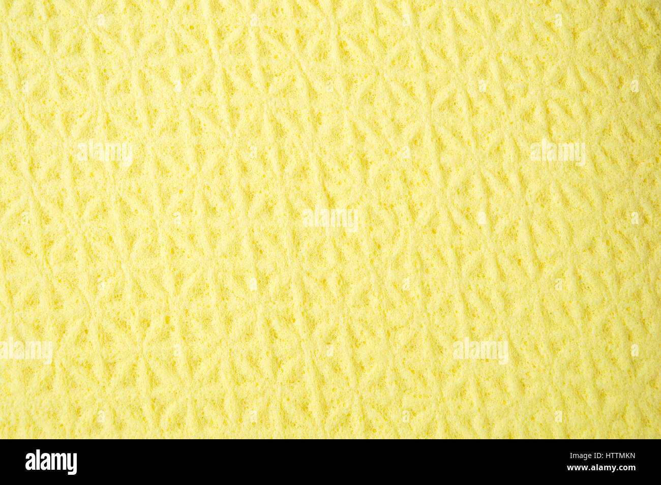 Yellow cleaning cloth background pattern close up Stock Photo - Alamy