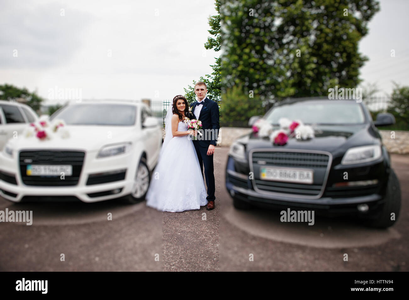Young stylish wedding couple against rich wedding cortege Stock Photo ...