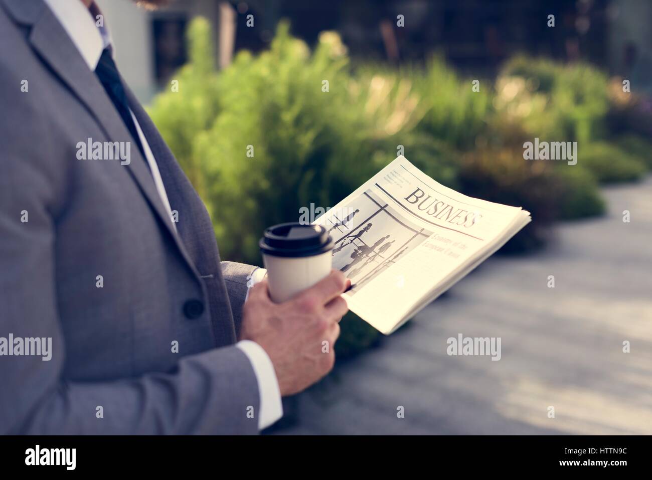 Businessmen Hands Hold Cup Read Newspaper Stock Photo - Alamy
