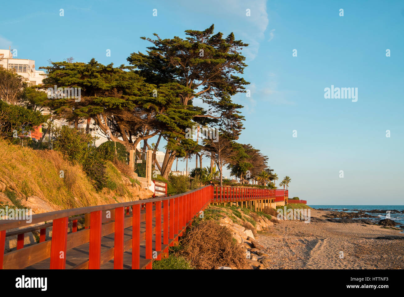 Wooden walkway, seafront promenade, connecting beaches of Costa del Sol ...
