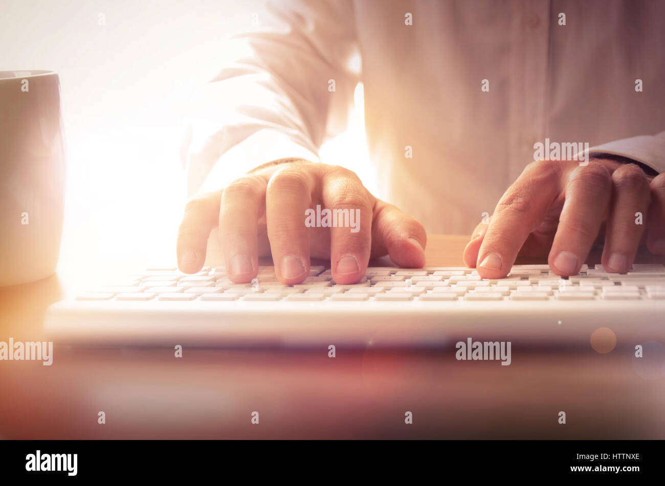 Businessman typing on computer keyboard at office. Concept for business ...