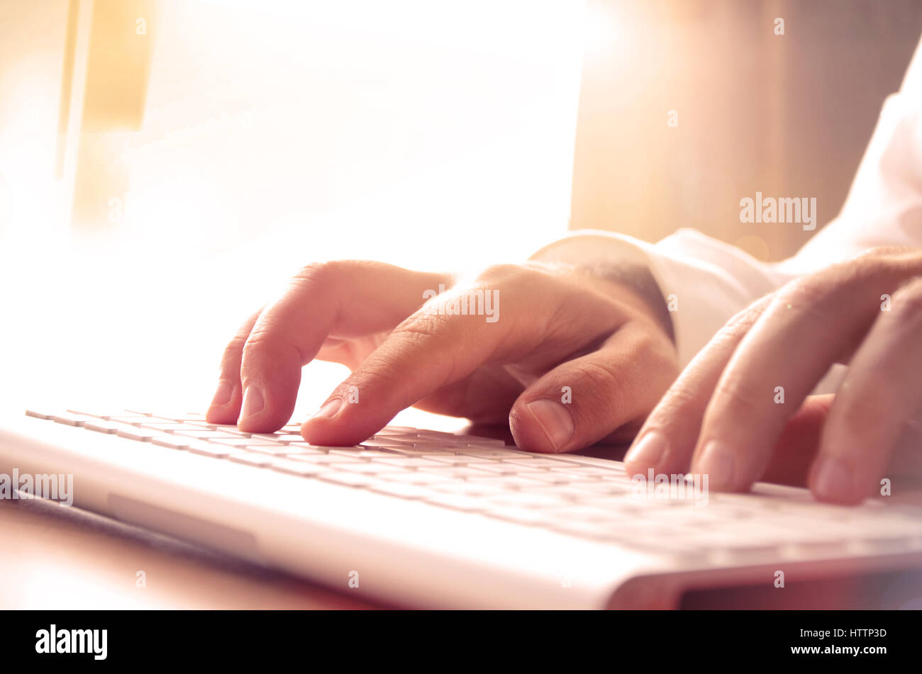 Man’s hands typing on computer keyboard. Concept for background ...