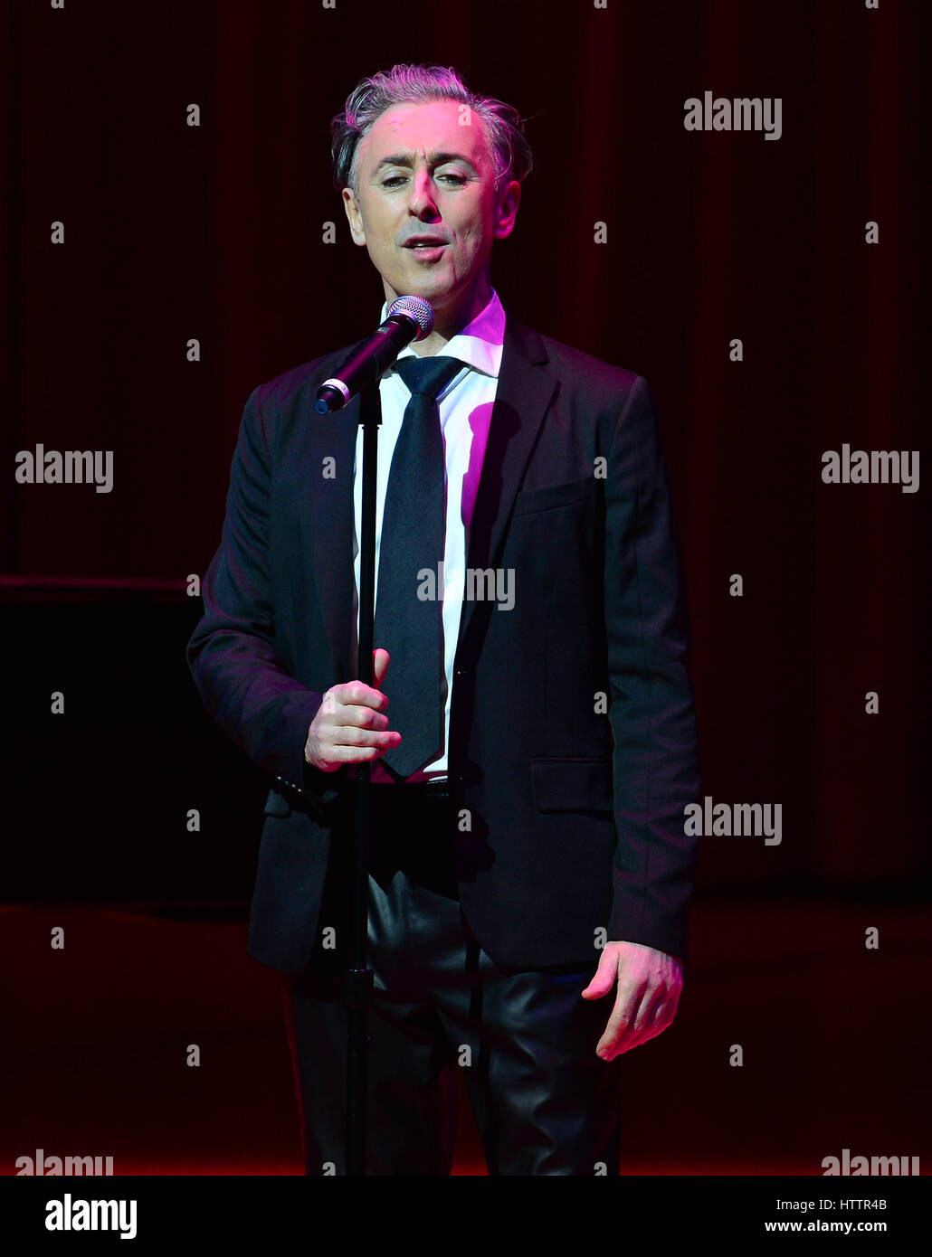 Alan Cumming performing on stage during his show 'Alan Cumming Sings ...