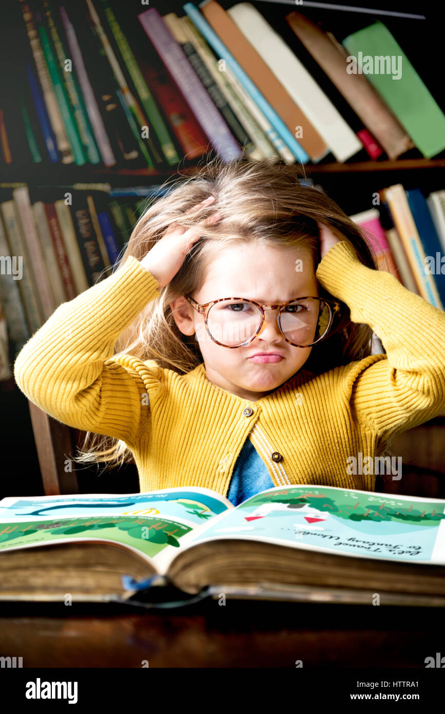 Adorable Cute Girl Reading Stressed Out Concept Stock Photo - Alamy