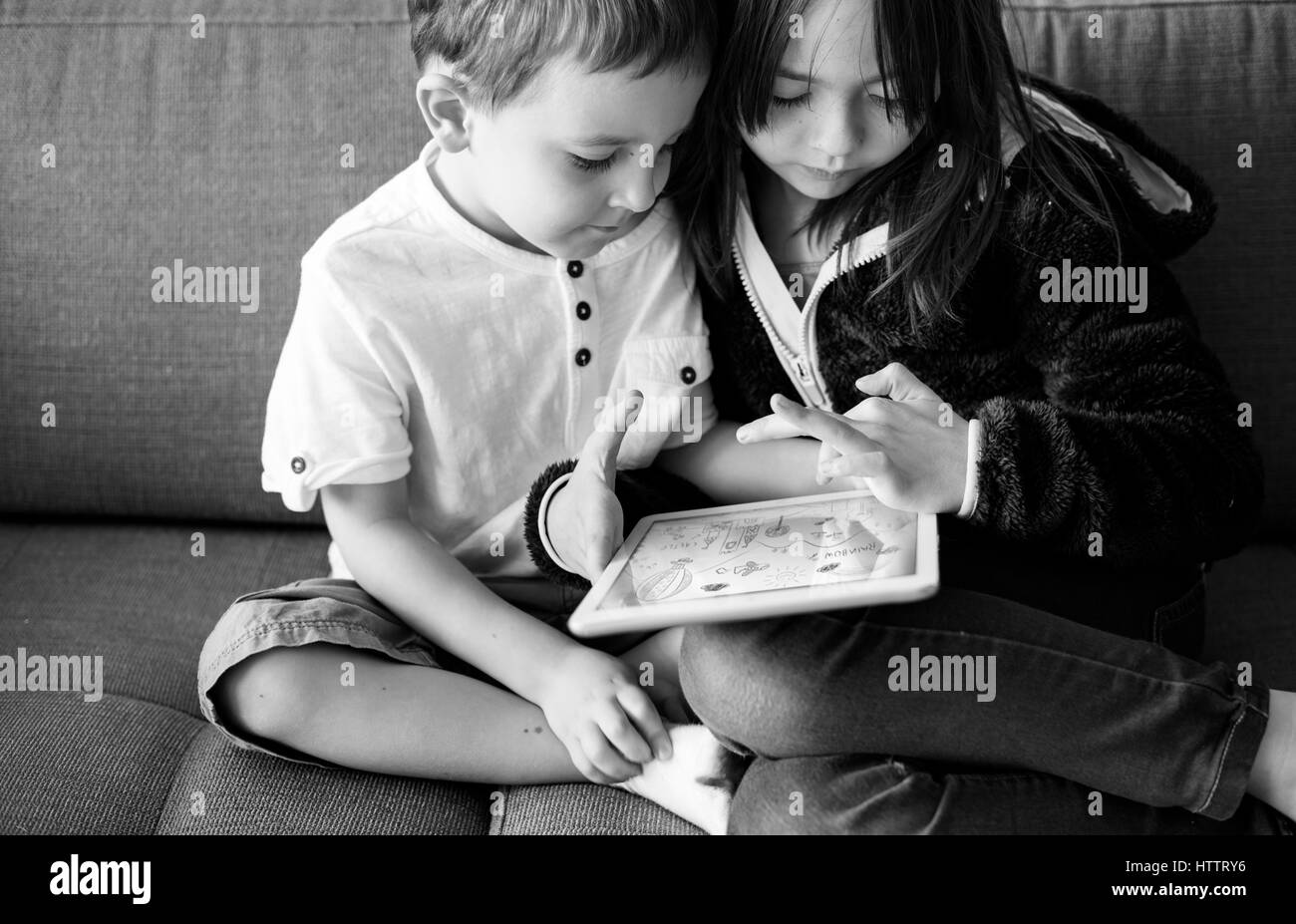 Brother sister sibling connection Black and White Stock Photos & Images ...